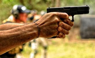 How to perform weapon safety check on pistols and rifles?